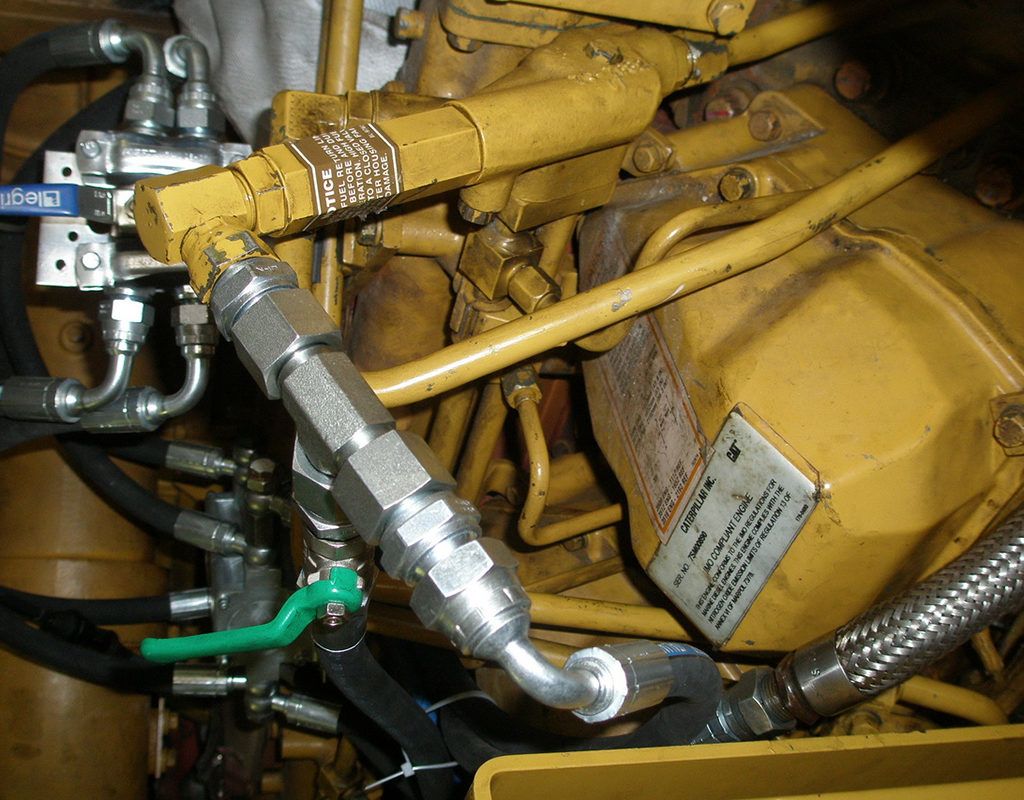 Installing fuel flow meter and level sensor on mining equipment